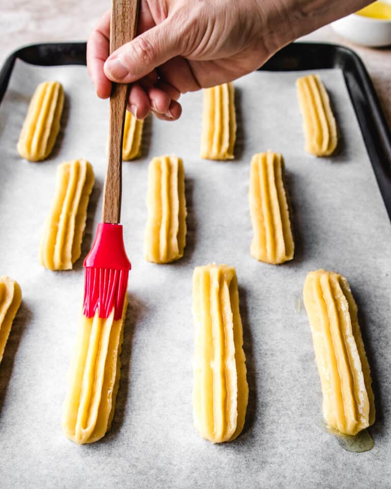 Crispy Cinnamon Sugar Oven-Baked Churros - Kickass Baker