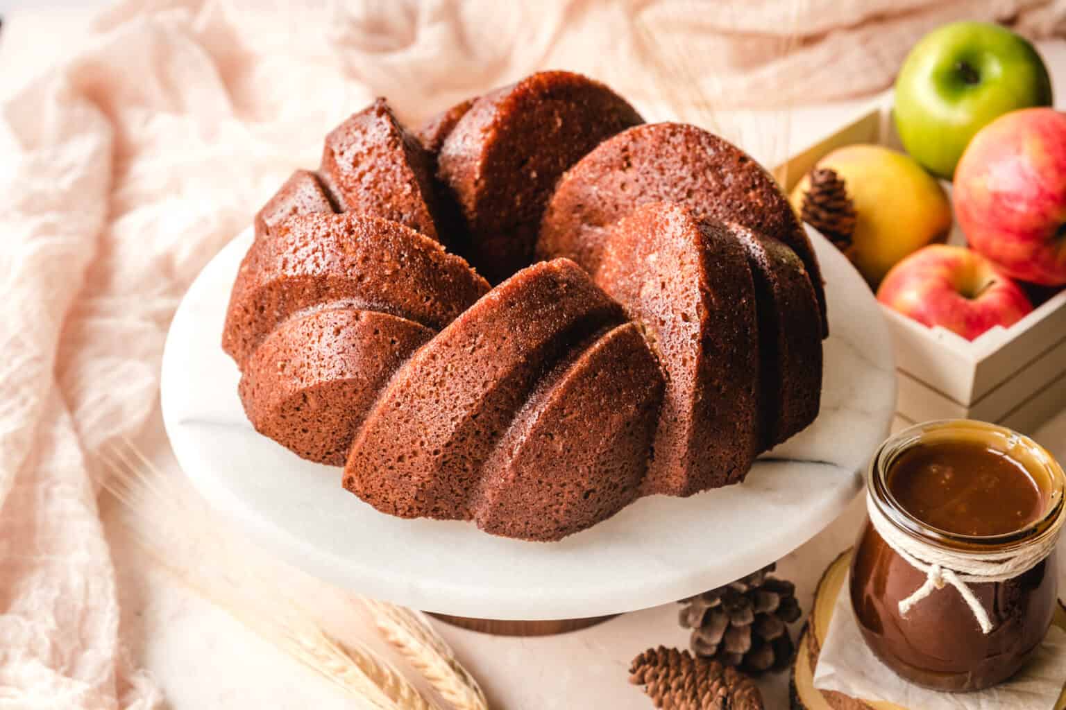 Spiced Applesauce Bundt Cake with Cider Glaze - Kickass Baker